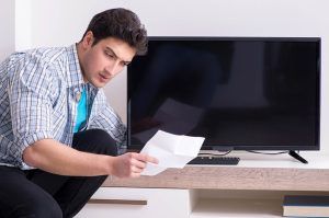 Why Does my Sharp TV keep Shutting OFF by itself? - Volt Fixer