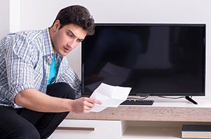 Why Does my Sharp TV keep Shutting OFF by itself? - Volt Fixer